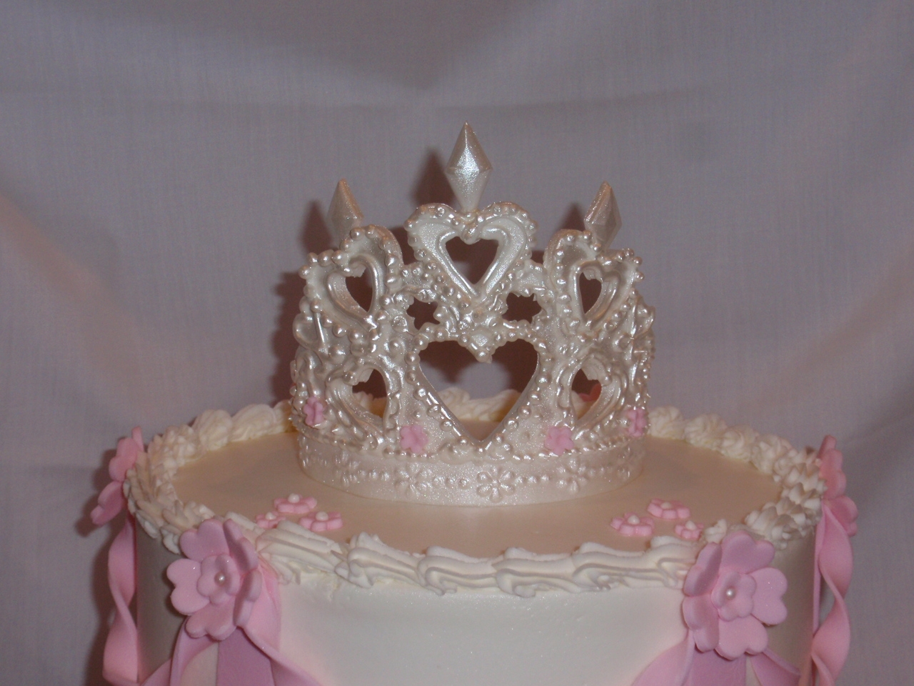A Simple Princess Cake With Buttercream Icing Fondant Decorations And ...