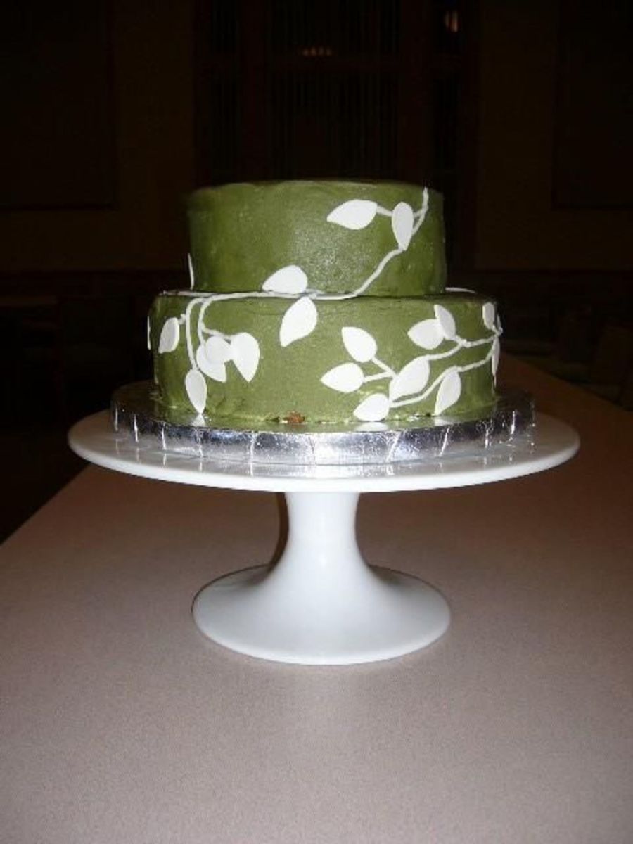 Green Buttercream With White Gum Paste Leaves - CakeCentral.com