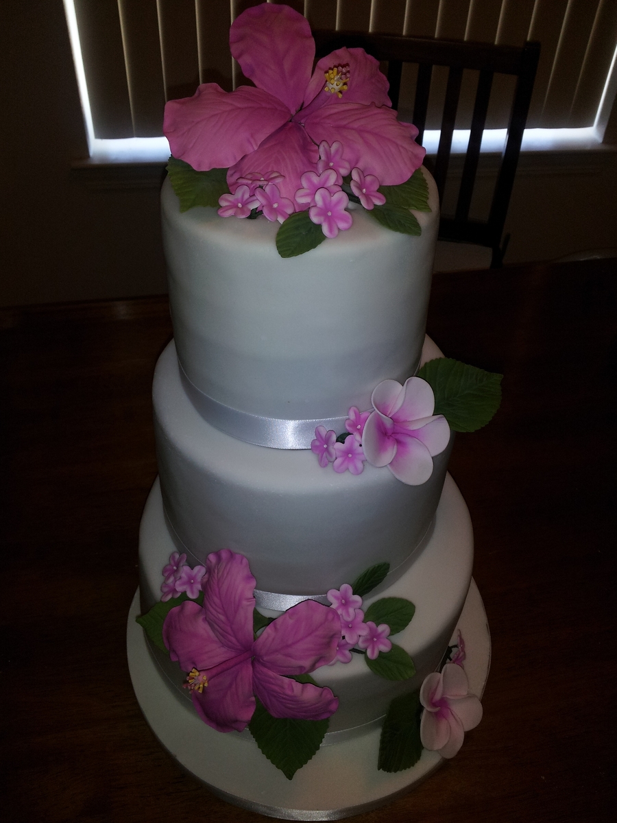 Magenta Flowers Wedding Cake - CakeCentral.com