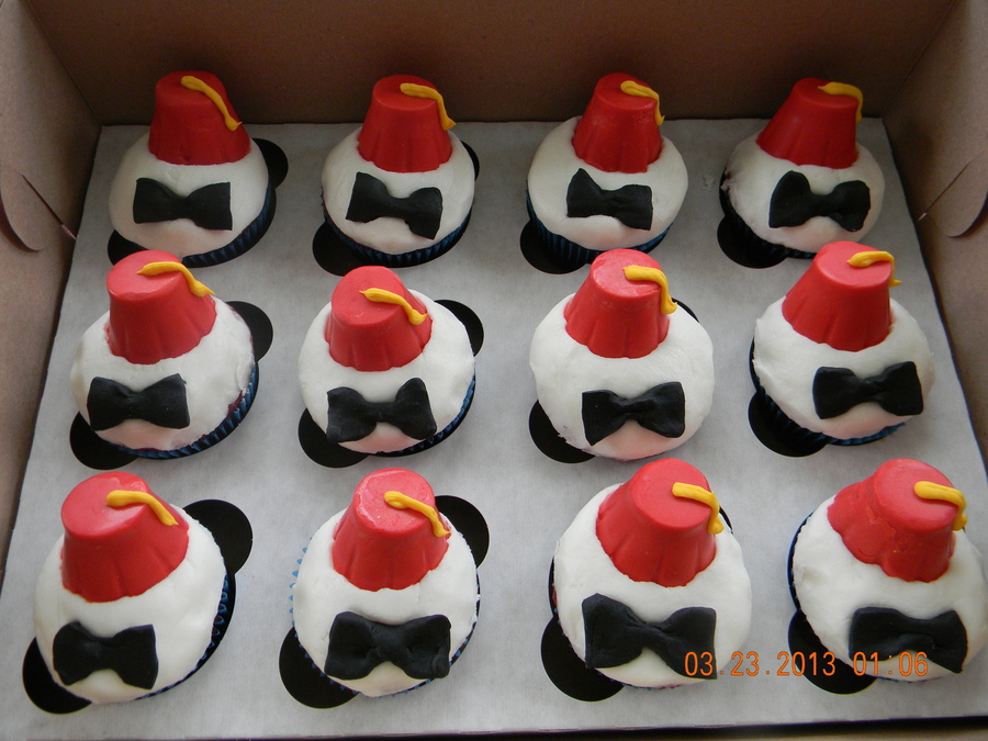 Red Velvet Cupcakes With Butter Cream Frosting Adorned With Re Modeling ...