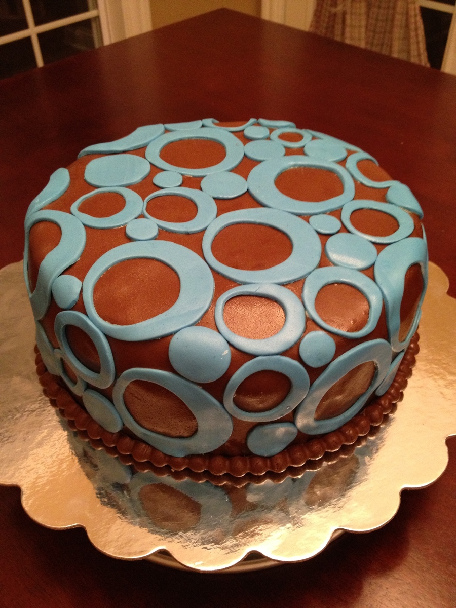 Blue Circles And Chocolate Fondant - CakeCentral.com