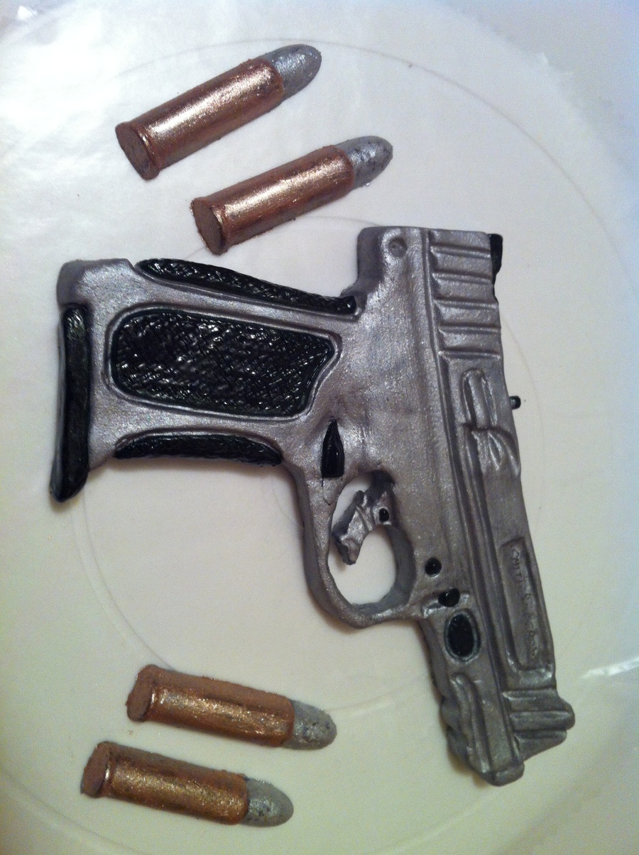 Weapon Topper - CakeCentral.com