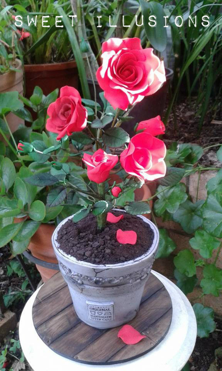 Rose Bush Gravity Cake - CakeCentral.com