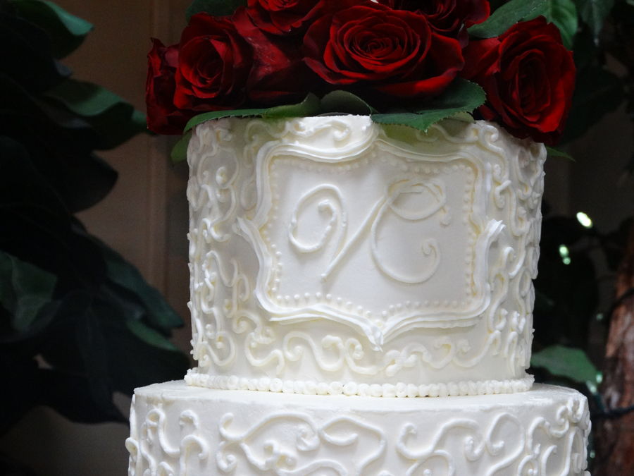 Filigree And Rosettes Wedding Cake - CakeCentral.com